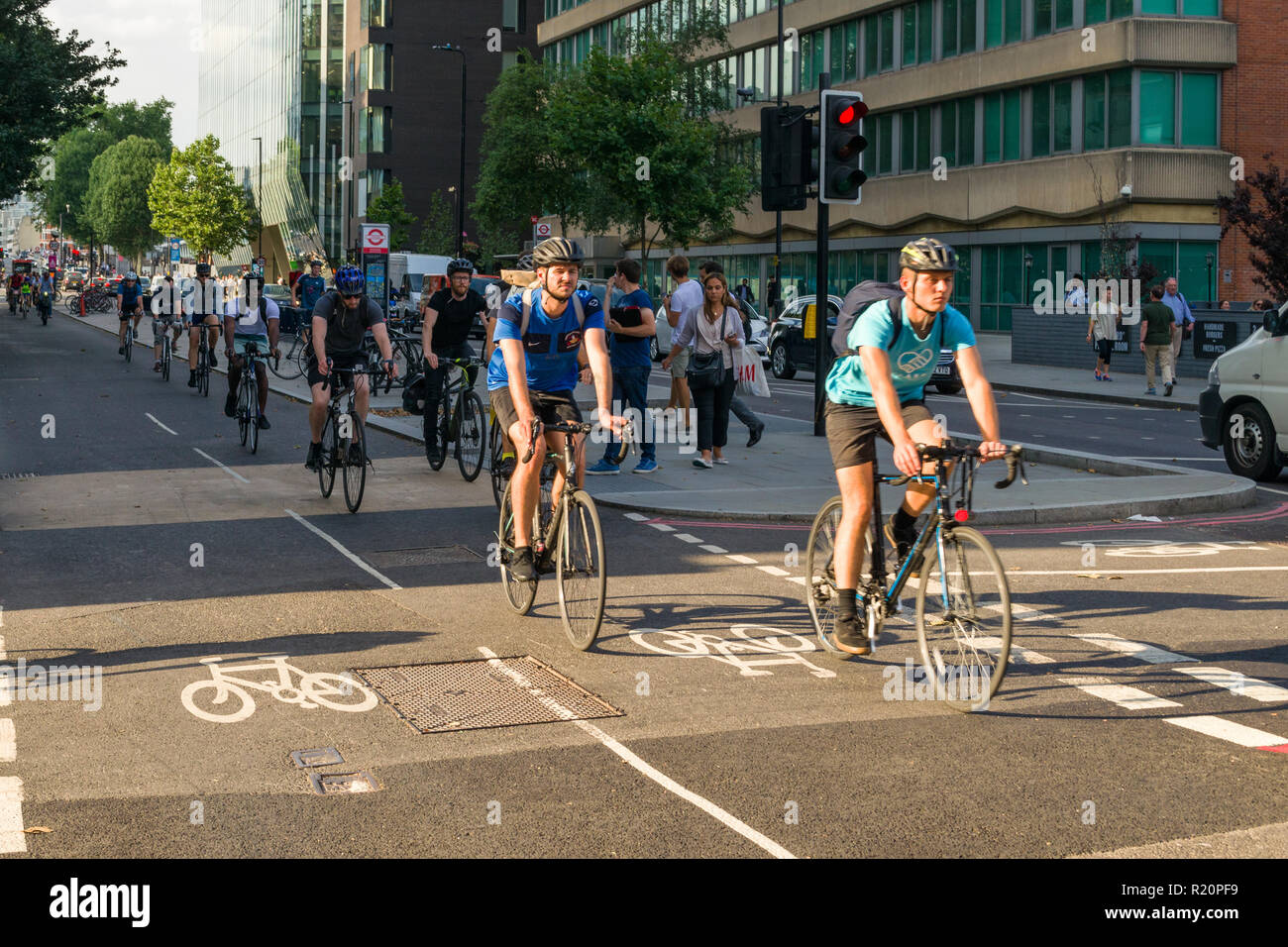 Cyclists commuting on the CS6 cycle superhighway on Blackfriars Road at ...