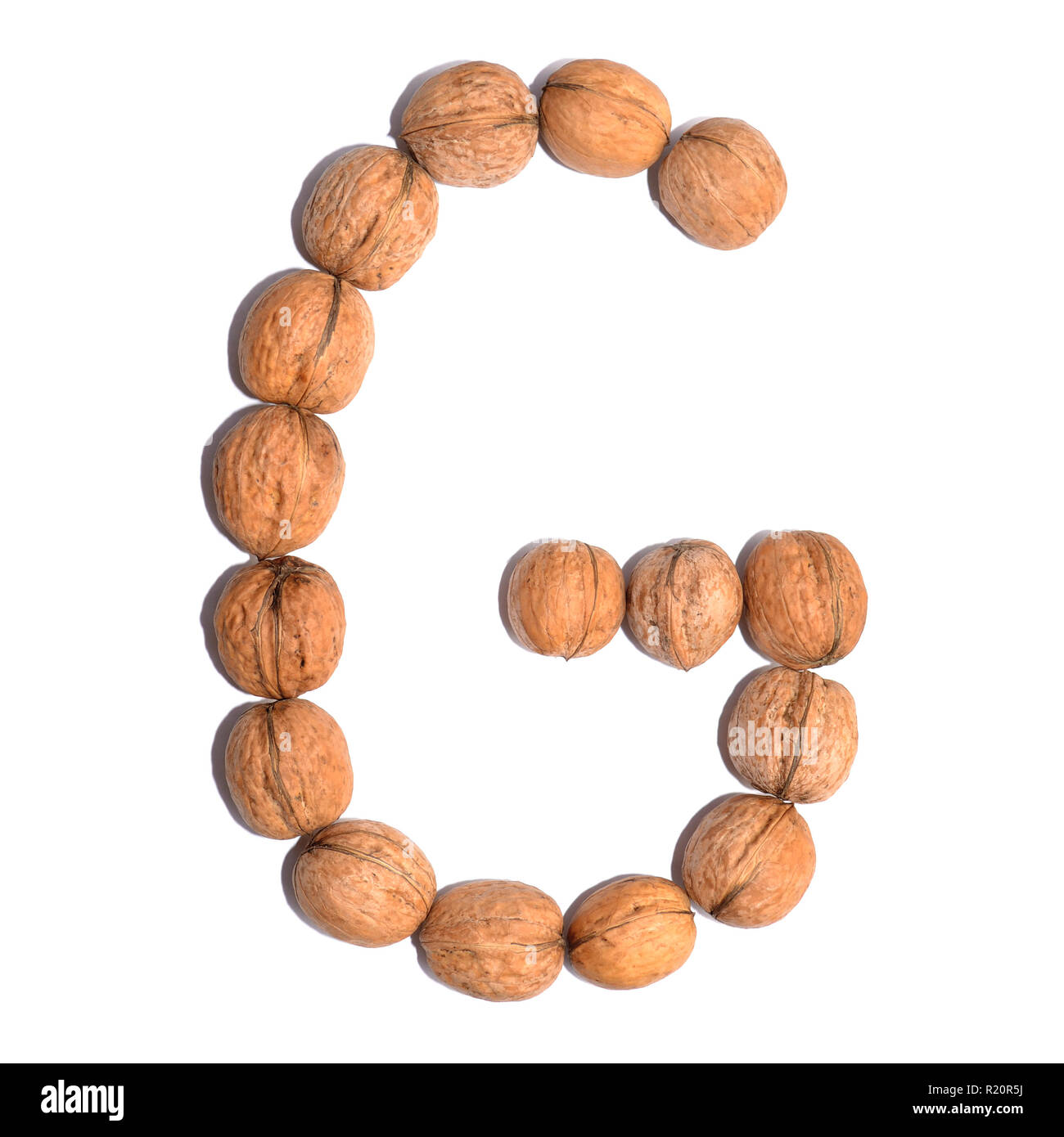 Letter G made with nuts to form a letter of the alphabet. Fruit letters ...