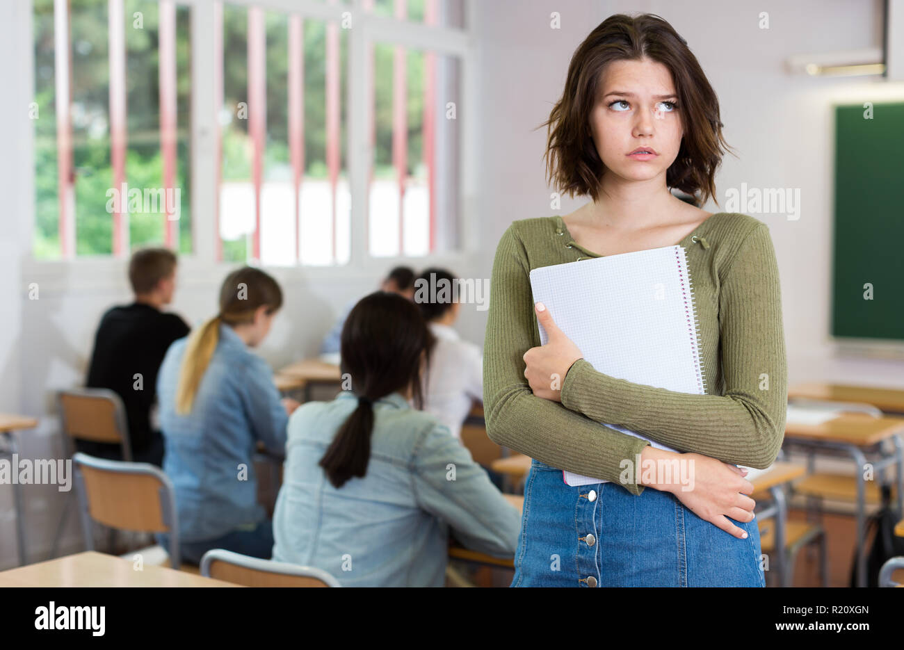 Girl is upset because bad assessment for test in the class Stock Photo ...