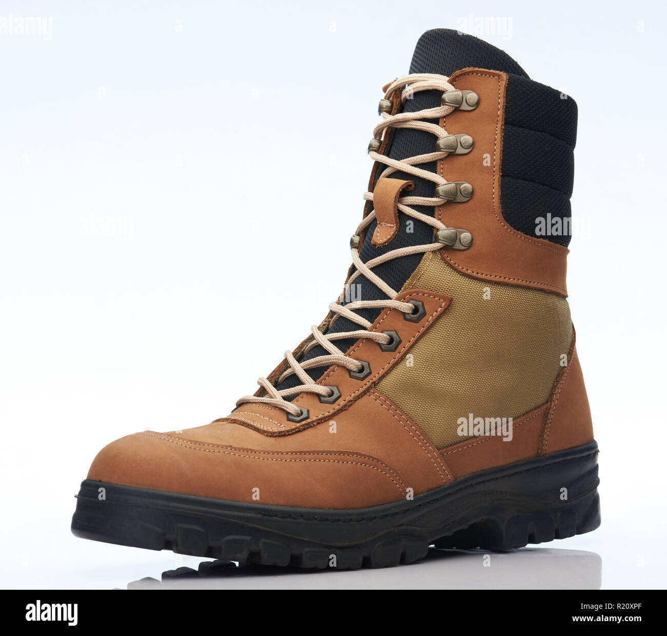 One military shoe isolated on white background Stock Photo - Alamy