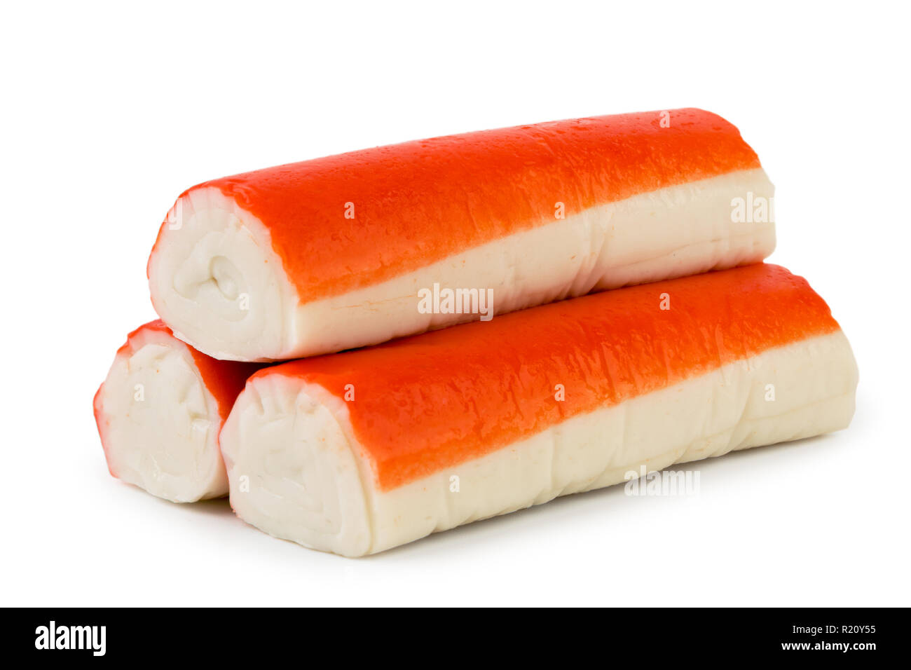 Three crab sticks close up on a white. Isolated Stock Photo - Alamy