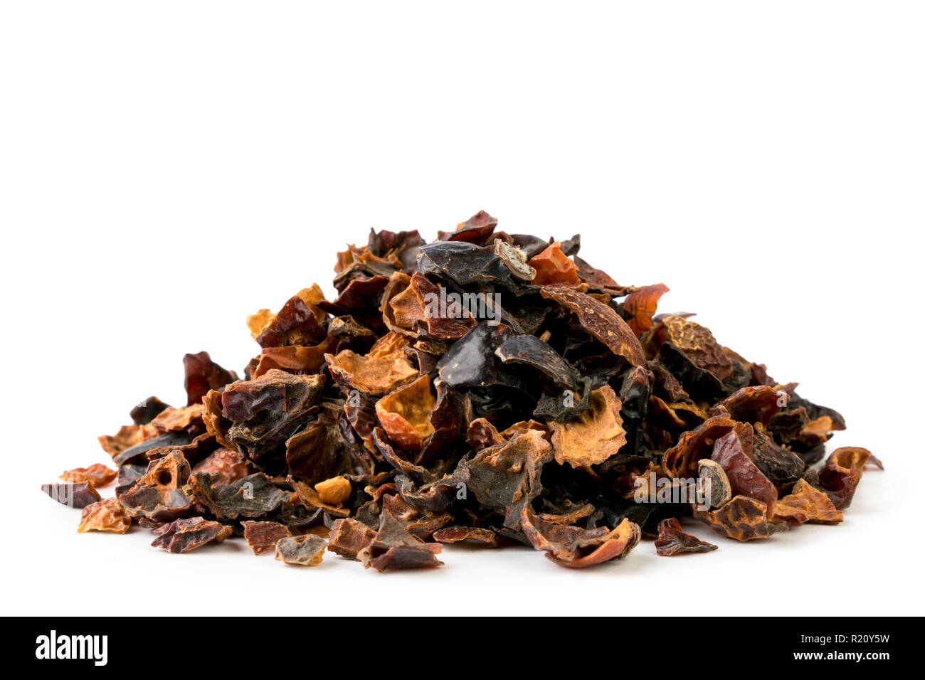 A bunch of the dry ground rose hips on a white, isolated Stock Photo ...