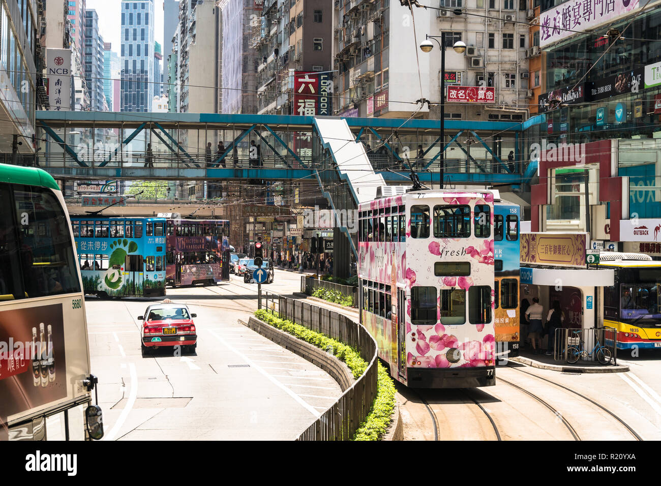 Hong Kong, China - May 16 2018: Tram and other traffic along Hennessy road in Causeway Bay, the ...