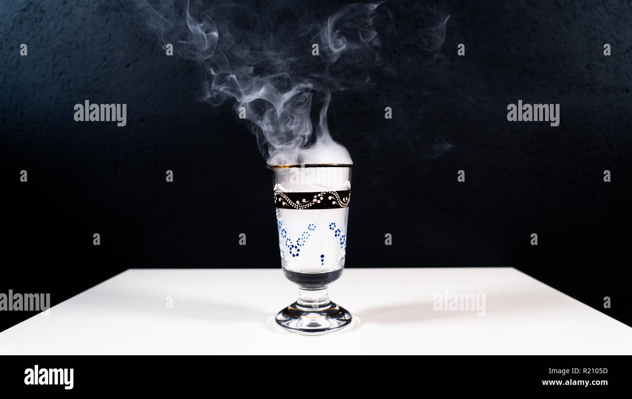 goblet glass full of smoke, goblet glas filled with smoke, smoke inside ...