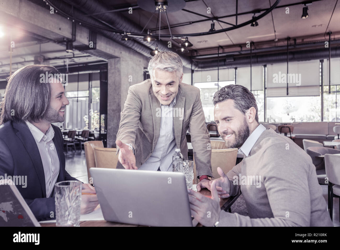 Talk teamwork technologies technology males hi-res stock photography ...