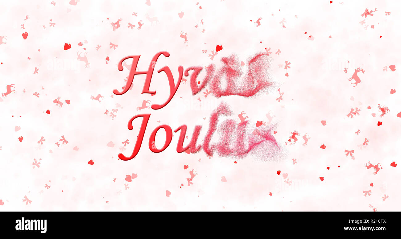 Merry Christmas text in Finnish "Hyvaa joulua" turns to dust from right ...
