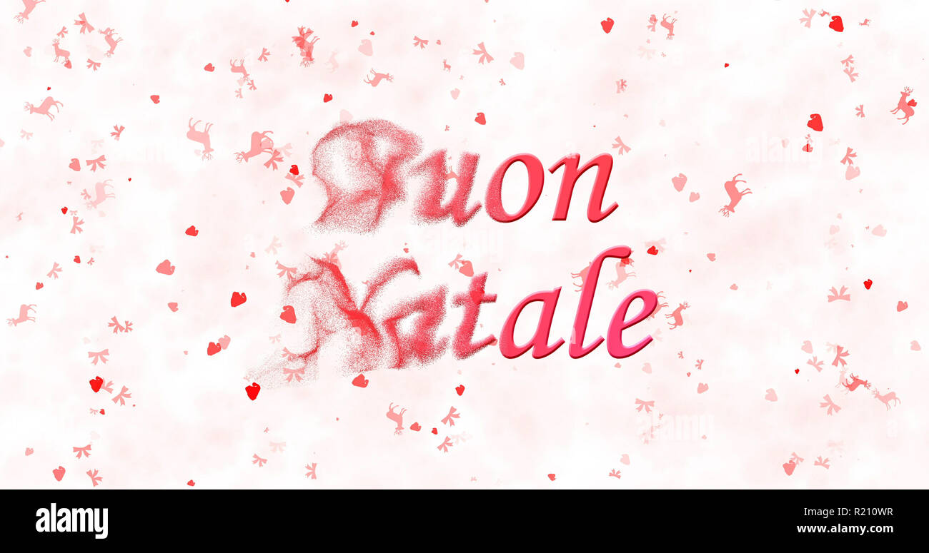 Merry Christmas text in Italian "Buon Natale" turns to dust from left ...