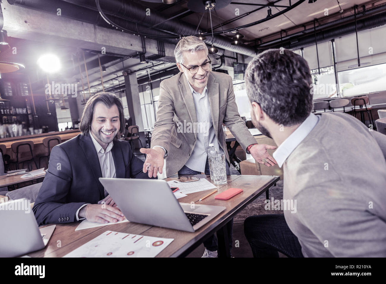 Talk teamwork technologies technology males hi-res stock photography ...