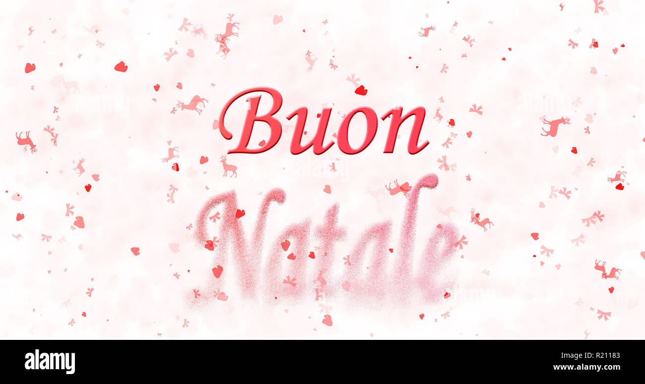 Merry Christmas text in Italian "Buon Natale" turns to dust from bottom ...