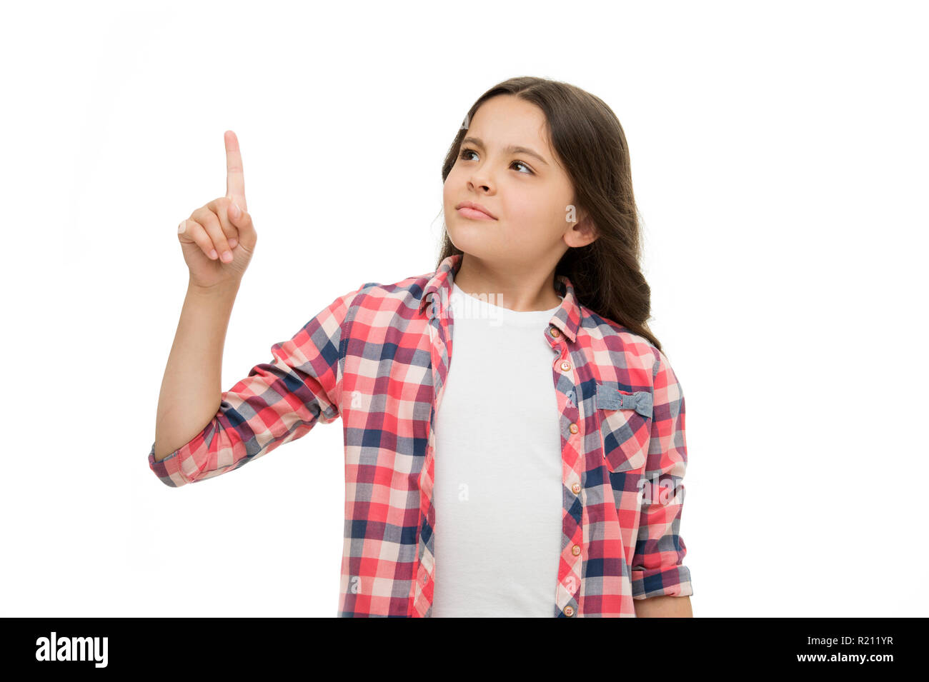 Wait a minute. Girl pointing upwards index finger. Child warning or ...