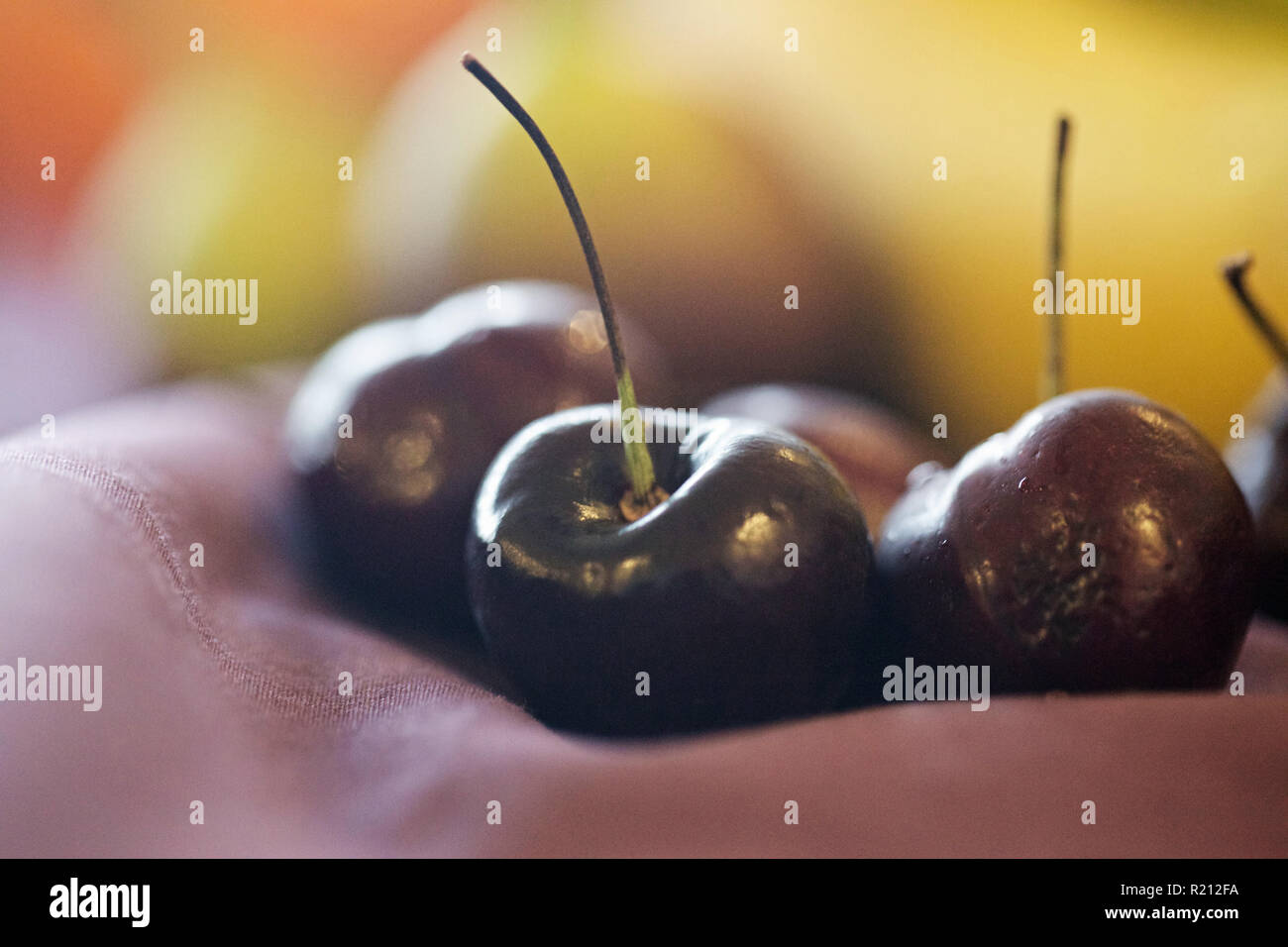 Glace cherry stalk hi-res stock photography and images - Alamy