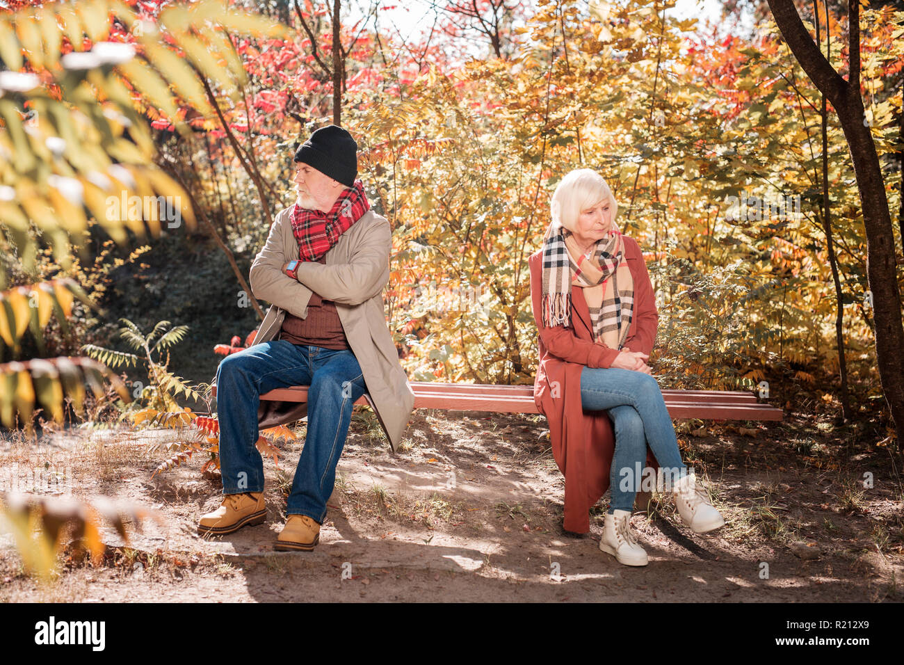 Sad aged people being angry with each other Stock Photo - Alamy