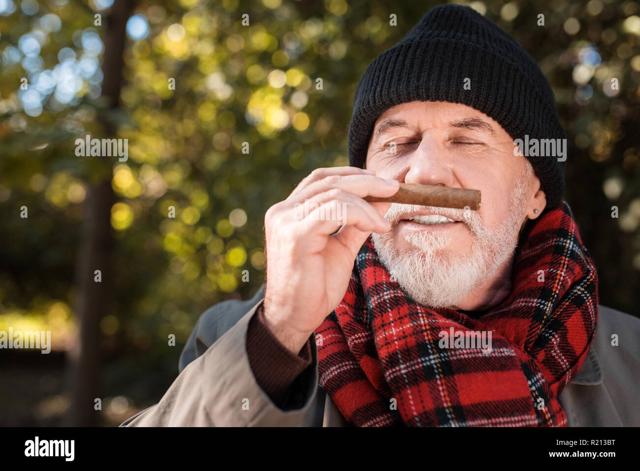 Smell cigar hi-res stock photography and images - Alamy