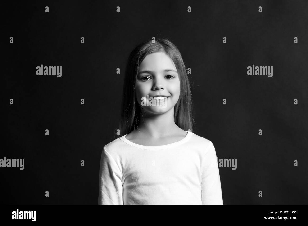 Happy child, childhood concept. Kid model smiling with long healthy ...