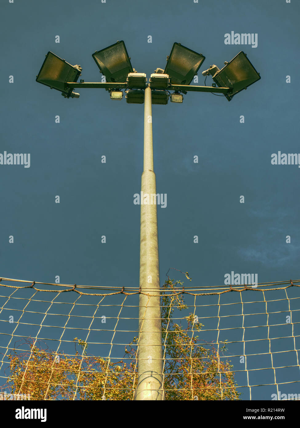 Lonely stadium light or lamp post with Union of light bulb stand alone ...