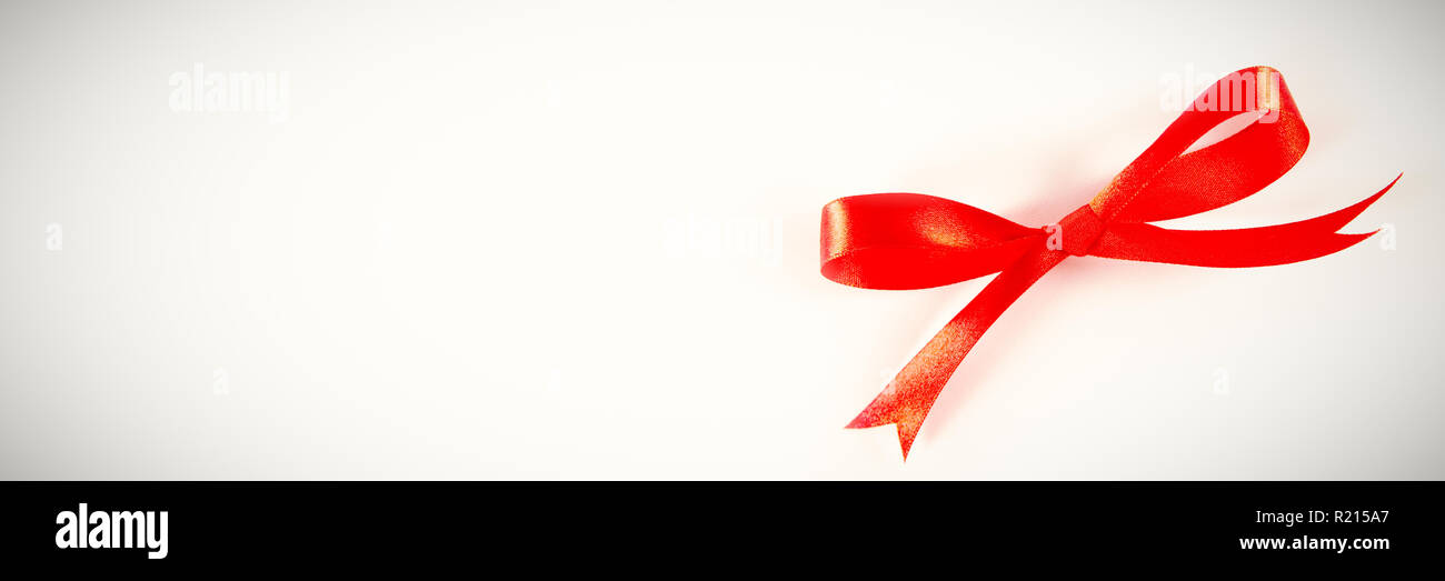 red ribbon bow Stock Photo - Alamy