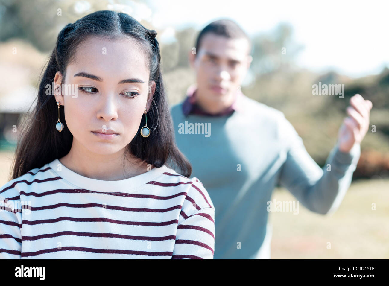 Portrait of sad female that being deep in thoughts Stock Photo - Alamy