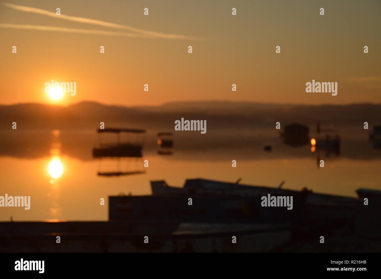 Sunset on a large lake Modrac Stock Photo - Alamy