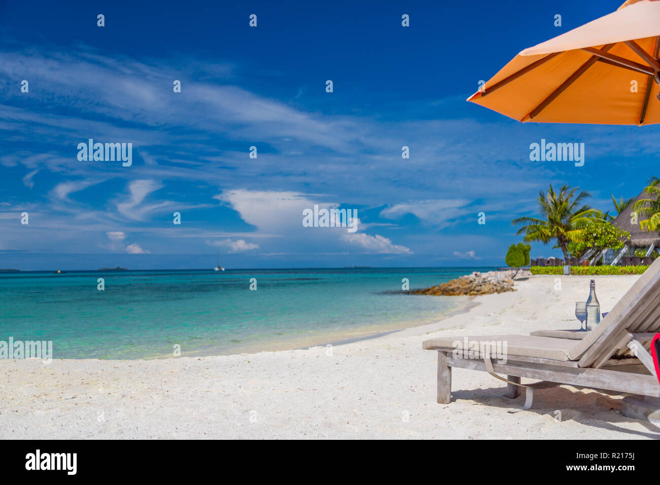 Romantic beach scene, two sun chairs and sunny beach mood. Exotic ...