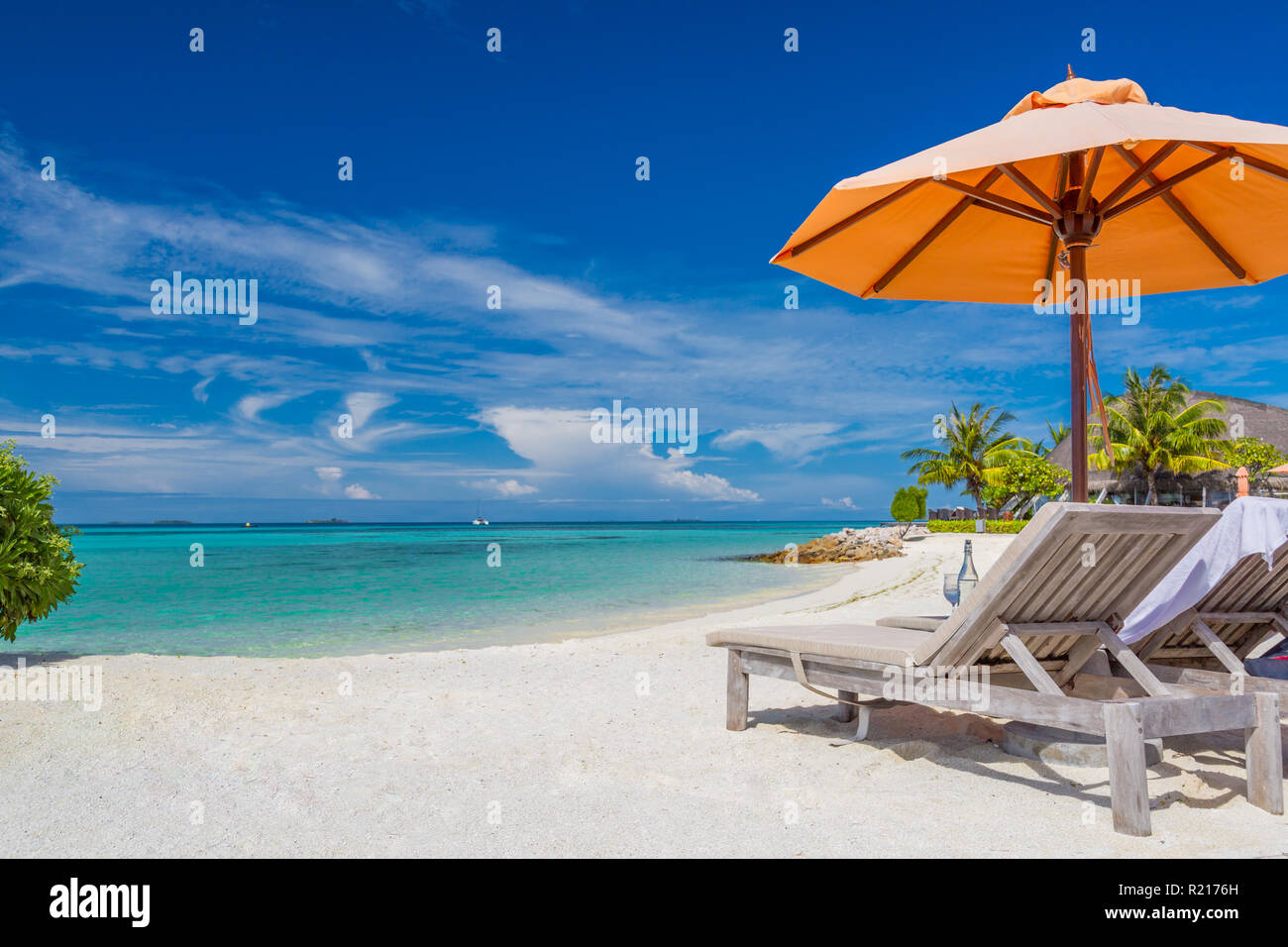 Romantic beach scene, two sun chairs and sunny beach mood. Exotic ...