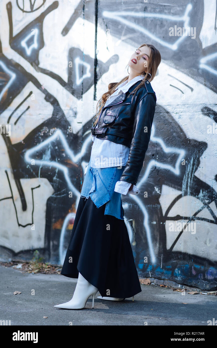 Fashion model wearing amazing trendy look while posing for photo ...