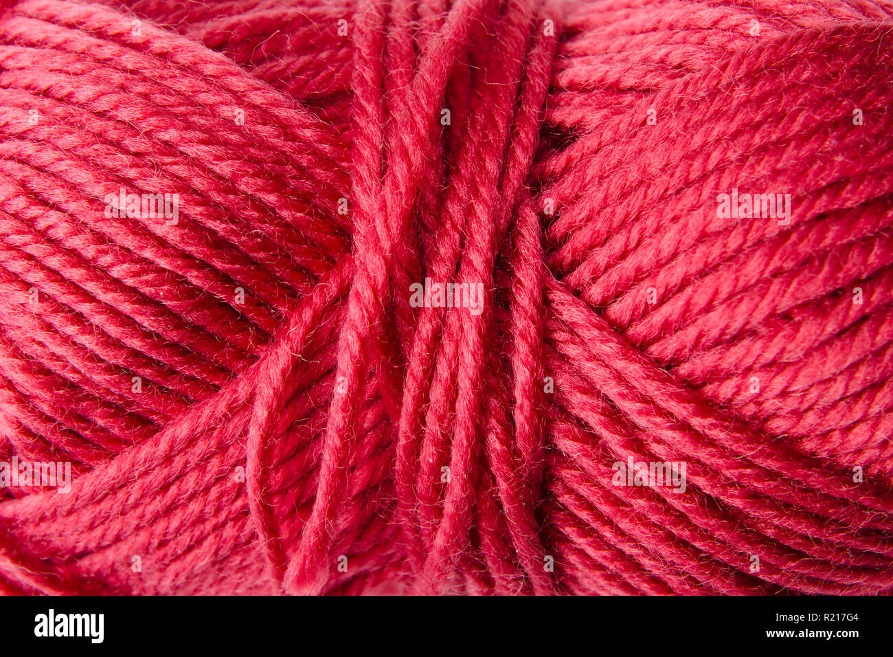 red yarn as a background Stock Photo - Alamy