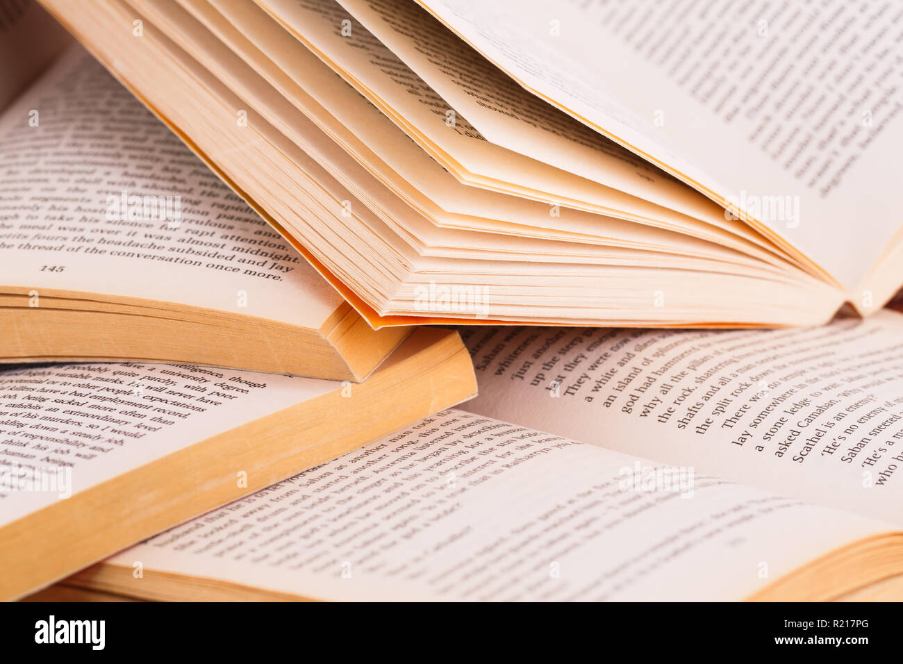 Opened books close up picture Stock Photo - Alamy