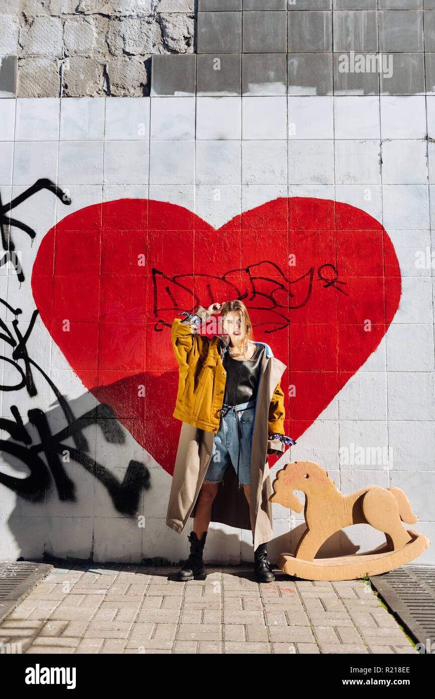 Wearing yellow jeans jacket hi-res stock photography and images - Alamy