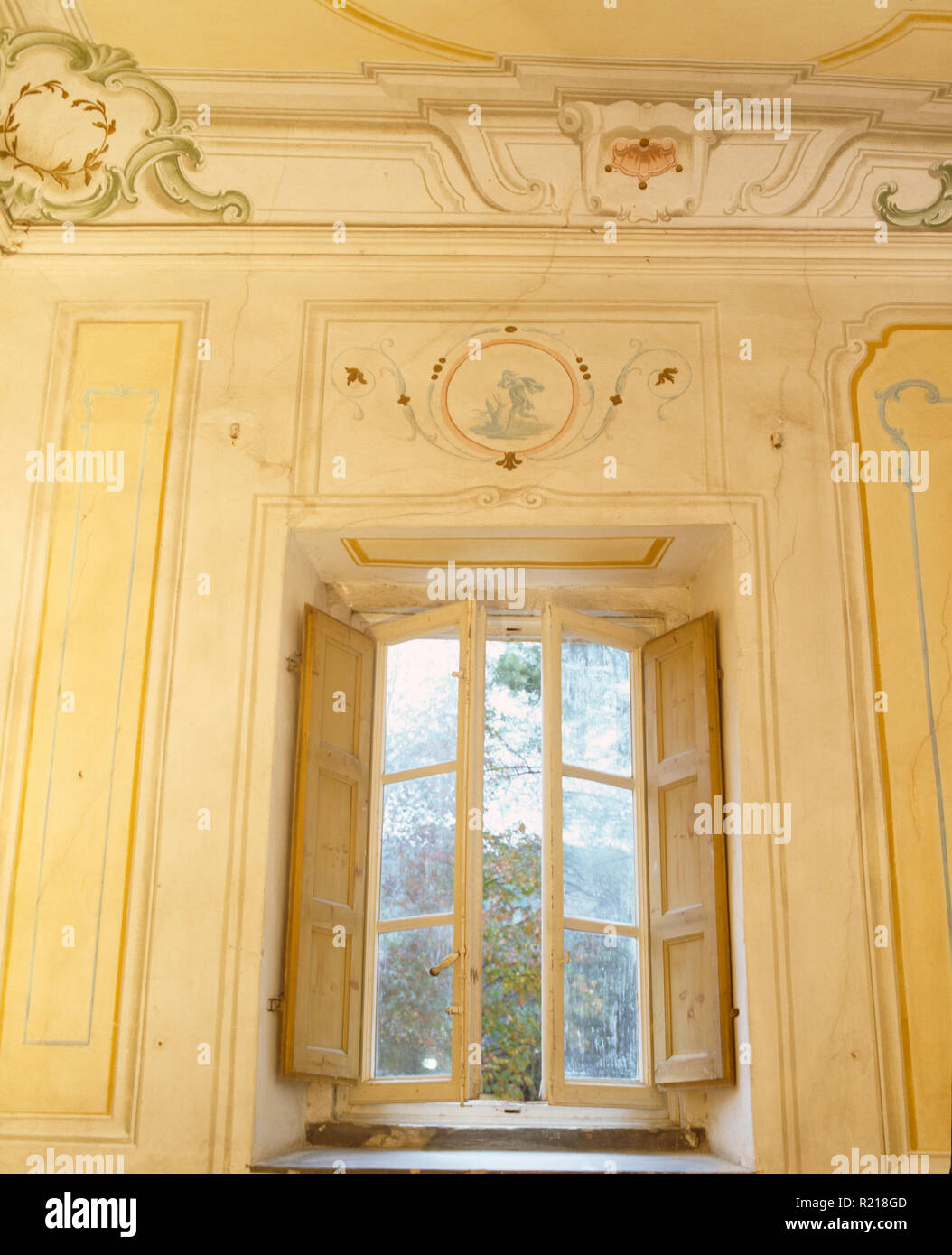 Vintage murals on ceiling and walls around window with shutters Stock ...