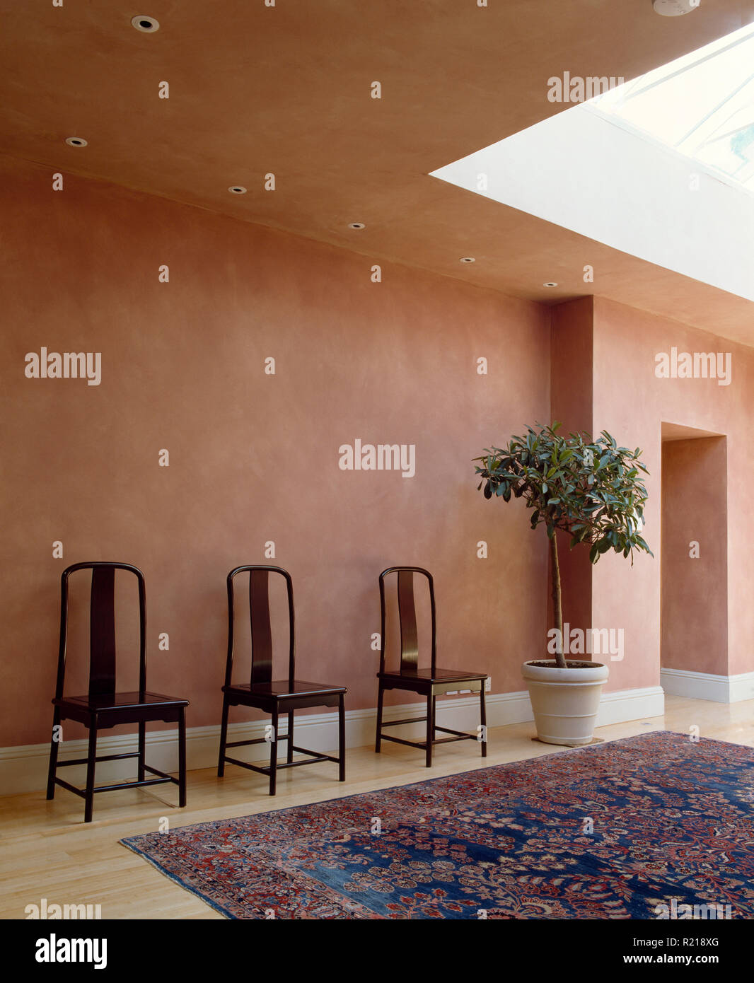 Modern Italian country hall with dining chairs Stock Photo - Alamy