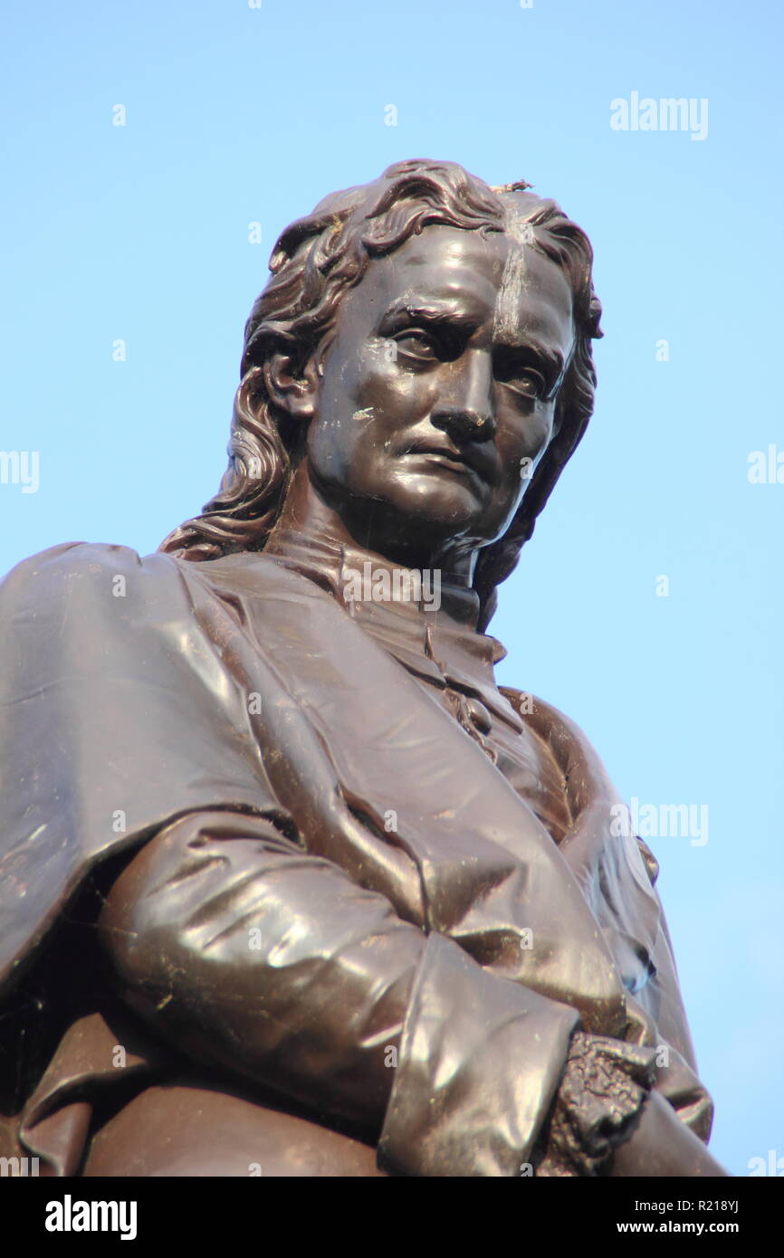 Statue of physicist and astronomer, Sir Isaac Newton in Grantham town ...