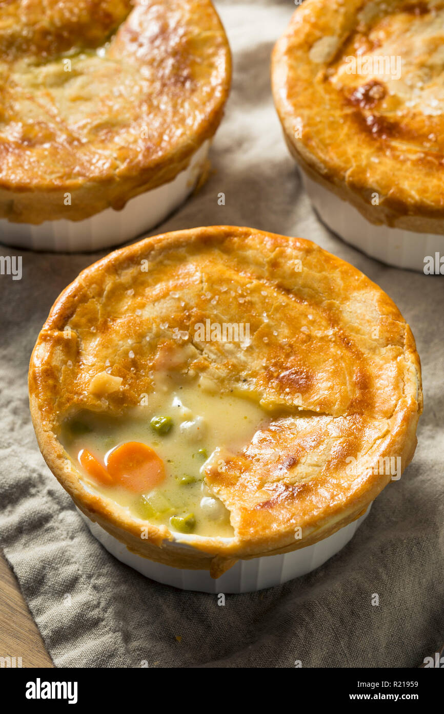 Homemade Individual Chicken Pots Pies Ready to Eat Stock Photo - Alamy