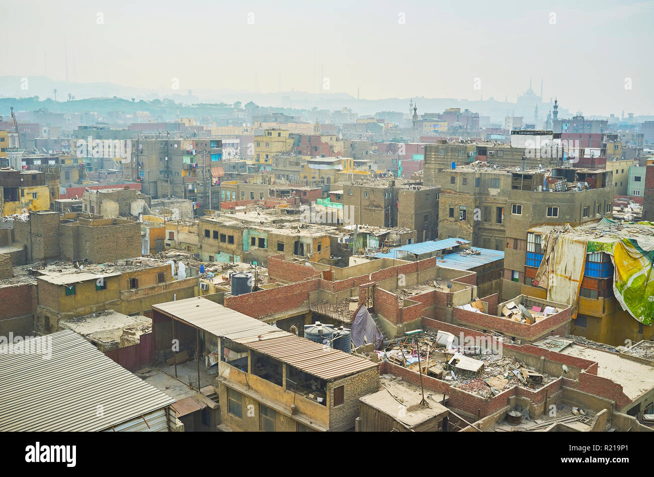 Observe the slums of Islamic Cairo district from the minaret of Al ...