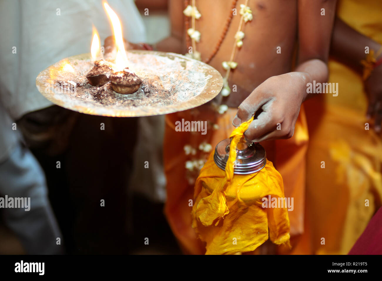 BATU CAVE, MALAYSIA - 31 JAN 2018 : Devotee carry a fire plate and a ...