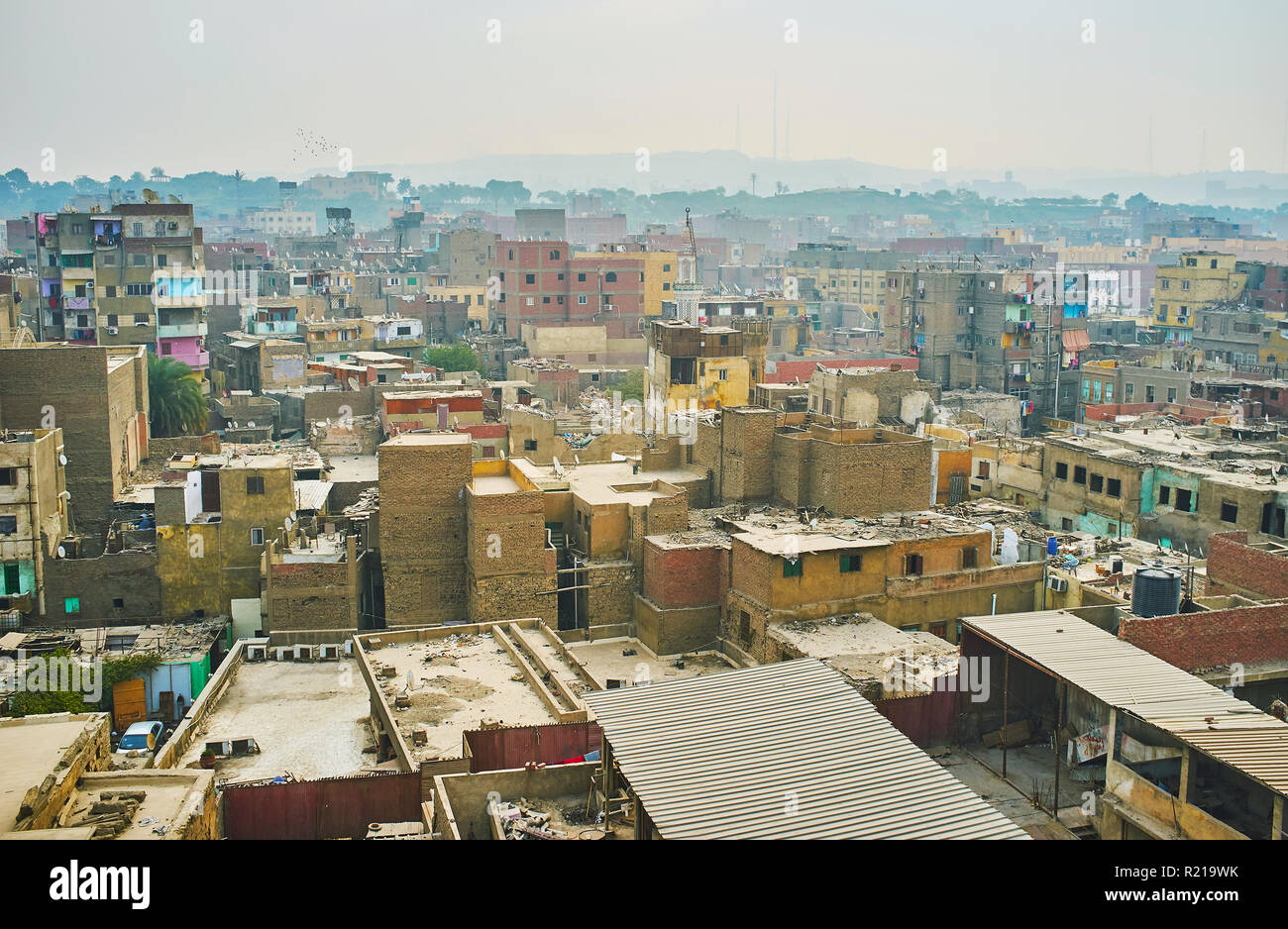 Islamic Cairo district is full of old slums, shanties, half-destroyed ...
