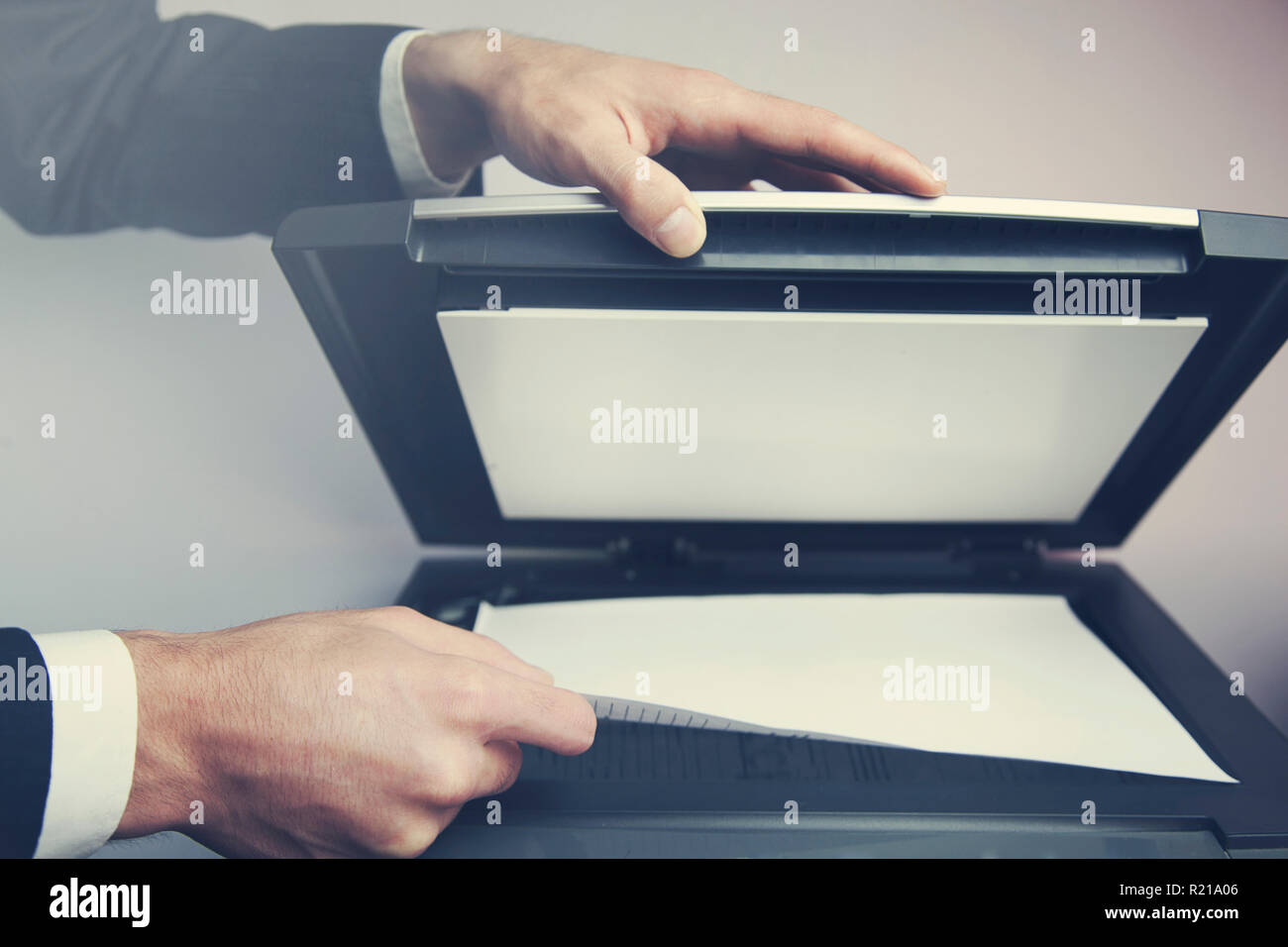The young businessman hand is scanner Stock Photo - Alamy