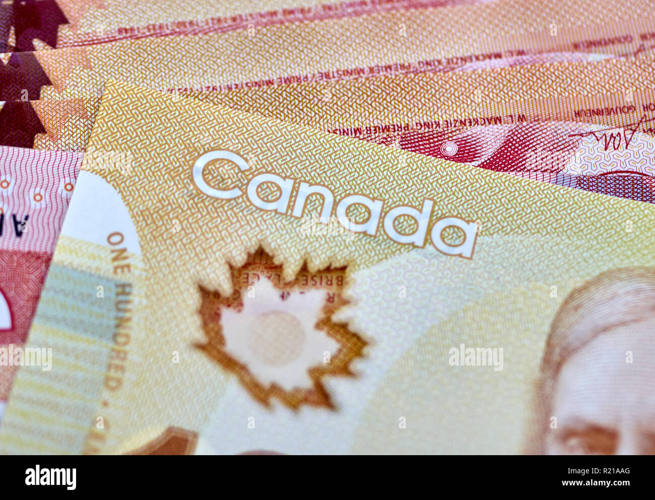 canadian money in a pocket of a blue jeans Stock Photo - Alamy