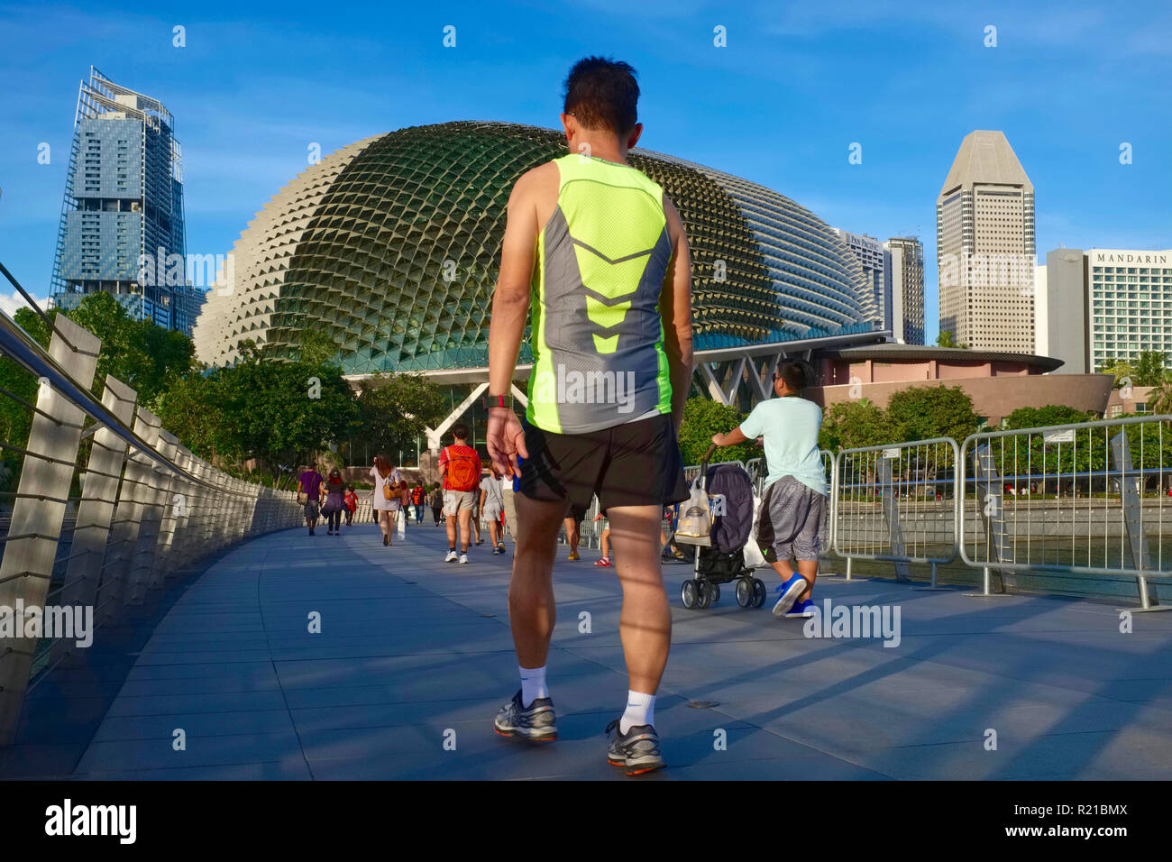A power walker on the Jubilee Bridge across Marina Bay, Singapore, the ...