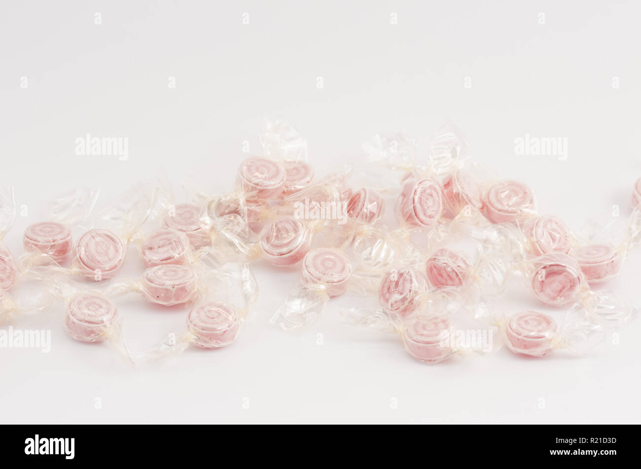 fruit flavor hard candies on a white surface Stock Photo - Alamy