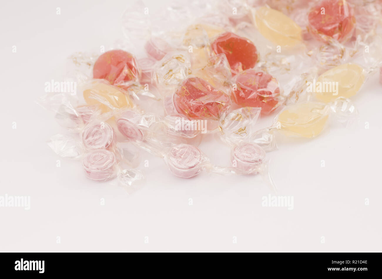 fruit flavor hard candies on a white surface Stock Photo - Alamy