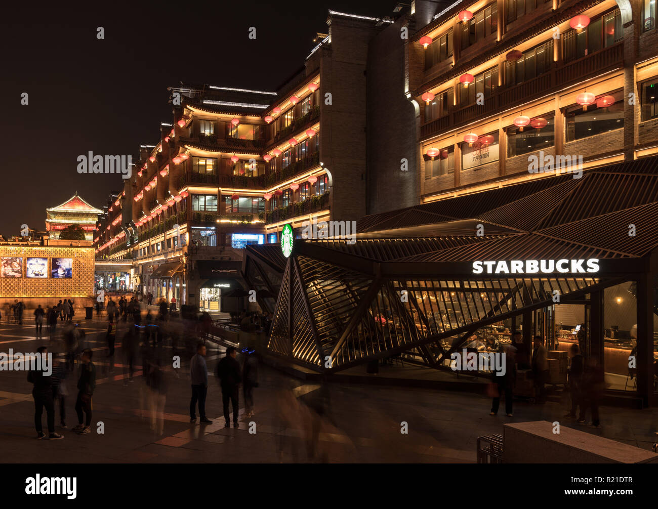 Starbucks by Bell tower in Xian, China at night Stock Photo - Alamy