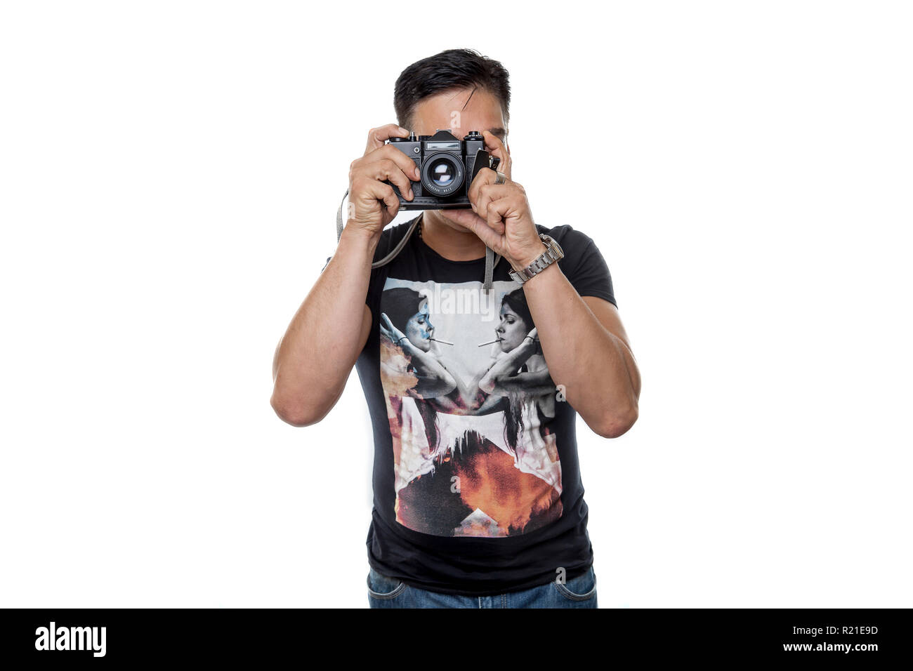 happy young man with camera on a white background Stock Photo - Alamy