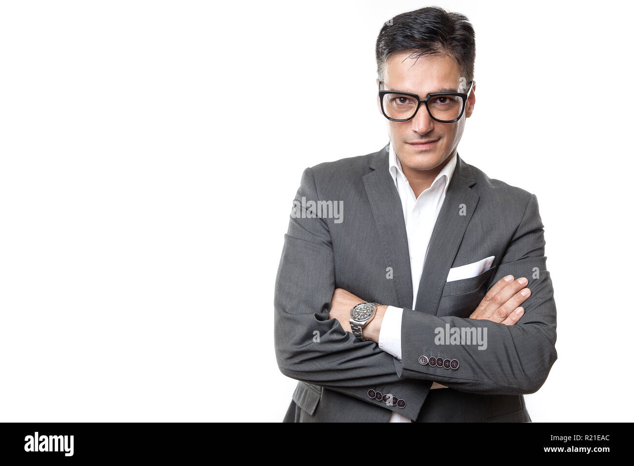 Portrait of a smiling business man isolated on white background. Studio ...