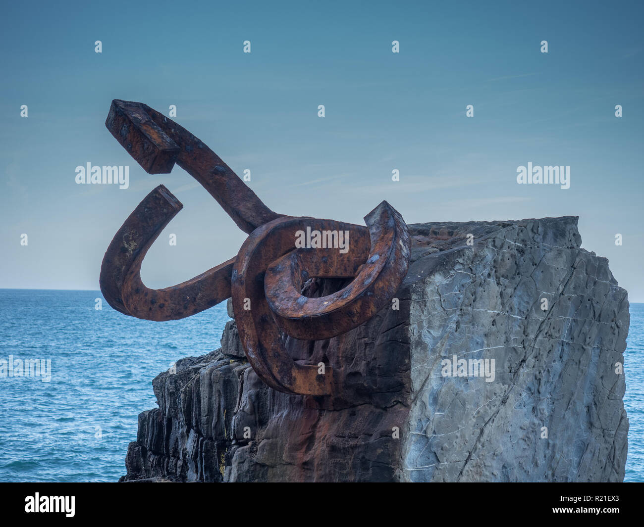 rusty iron sculpture in the sea Stock Photo - Alamy