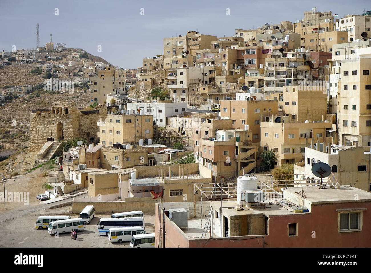 AL-KARAK, JORDAN - CIRCA NOVEMBER 2018 Houses on the hill in the center ...