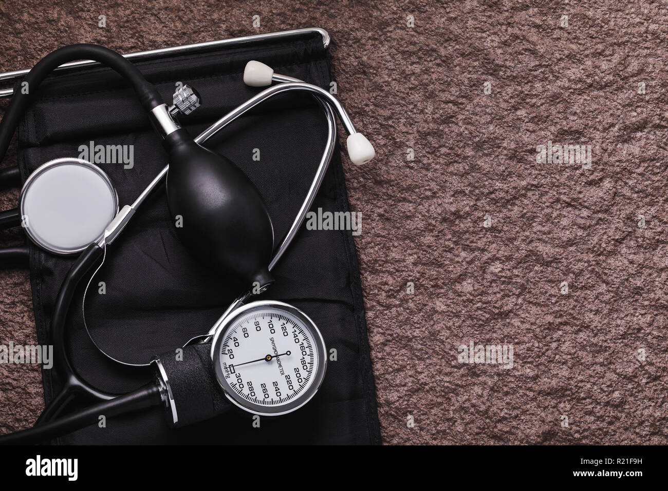 Medical Equipment For Measuring Blood Pressure On A Stone Surface With medical-equipment-for-measuring-blood-pressure-on-a-stone-surface-with