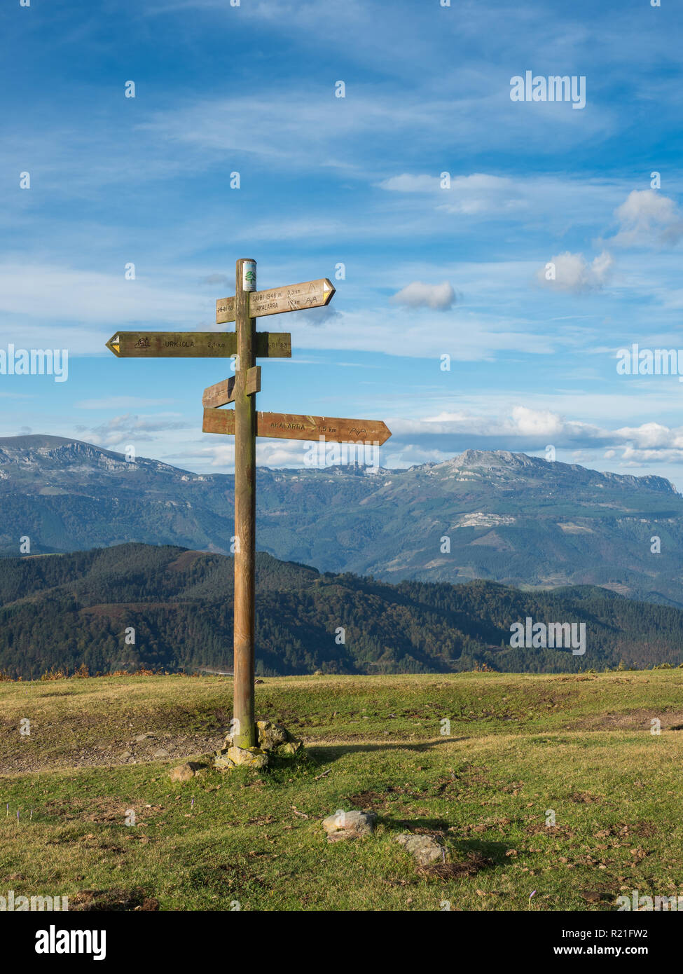 mountain road with an indicator Stock Photo - Alamy