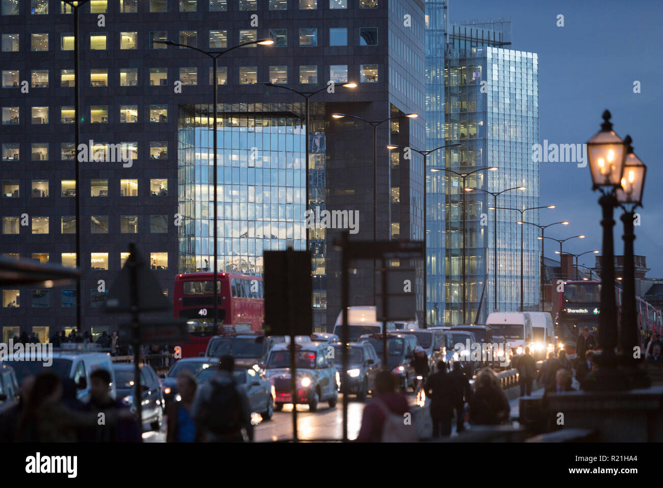 Buses and cars queue on London Bridge during the evening rush-hour, on ...