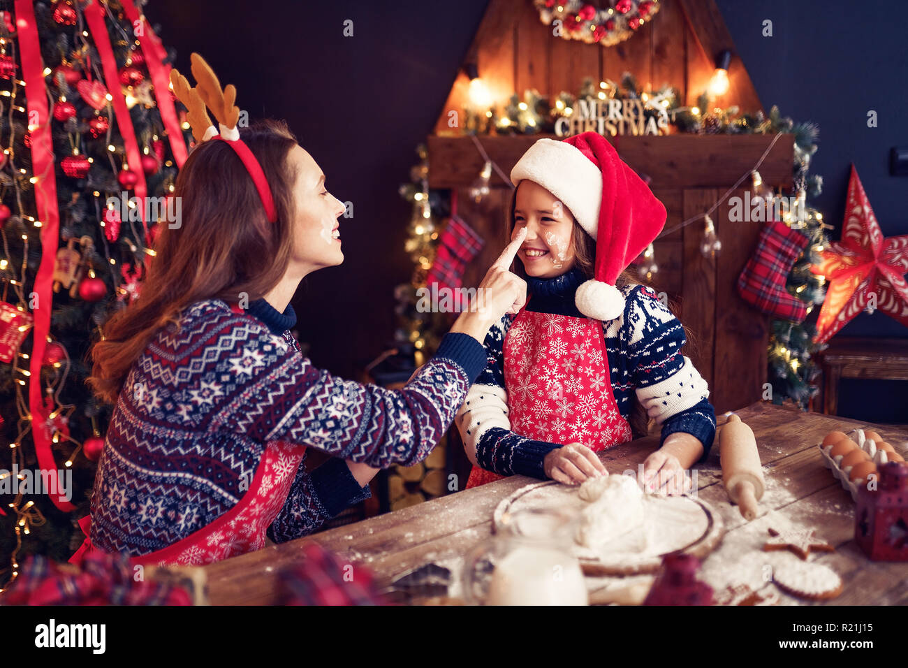 Merry Christmas and Happy Holidays. Family preparation holiday food ...