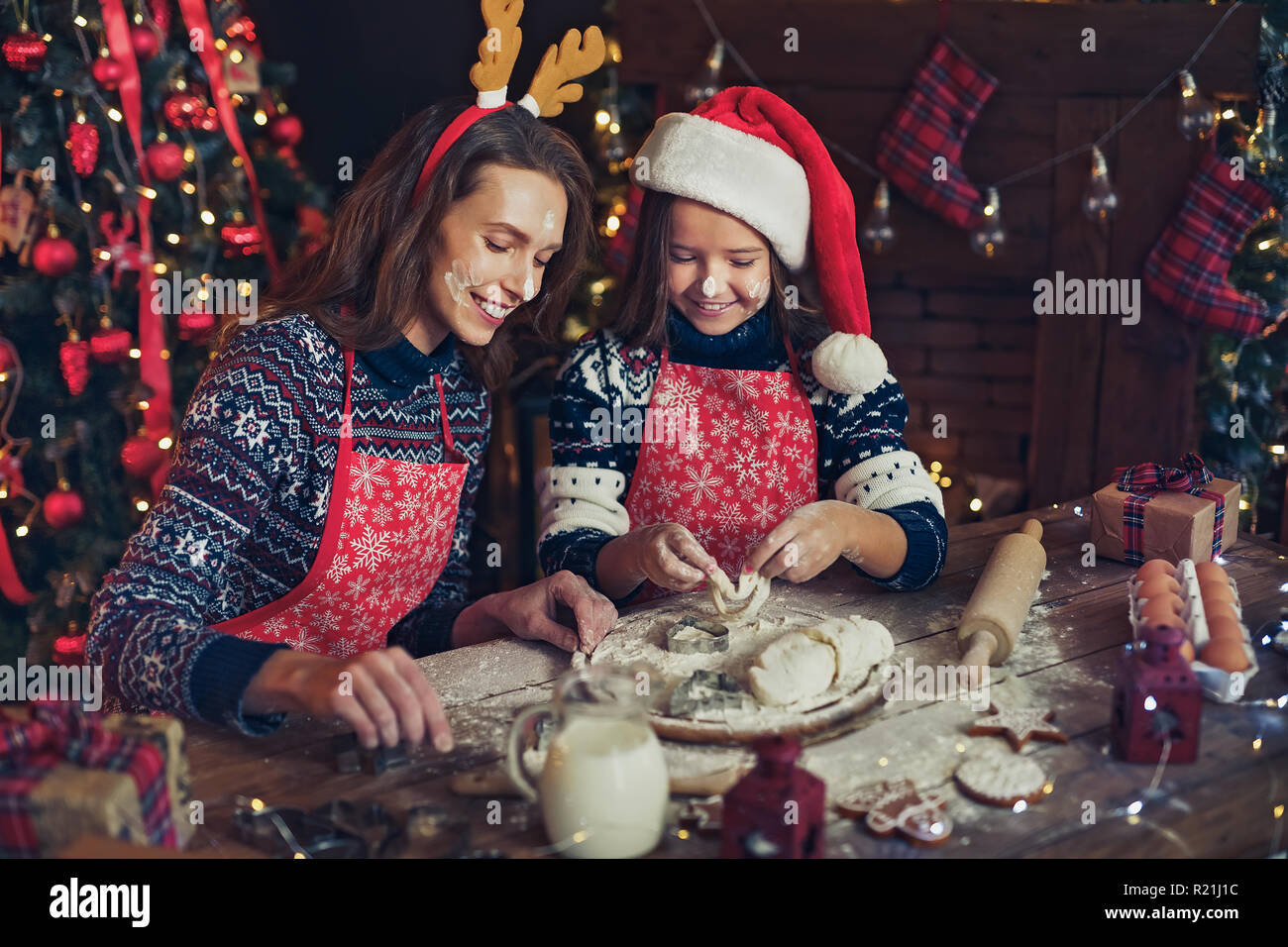 Merry Christmas and Happy Holidays. Family preparation holiday food ...